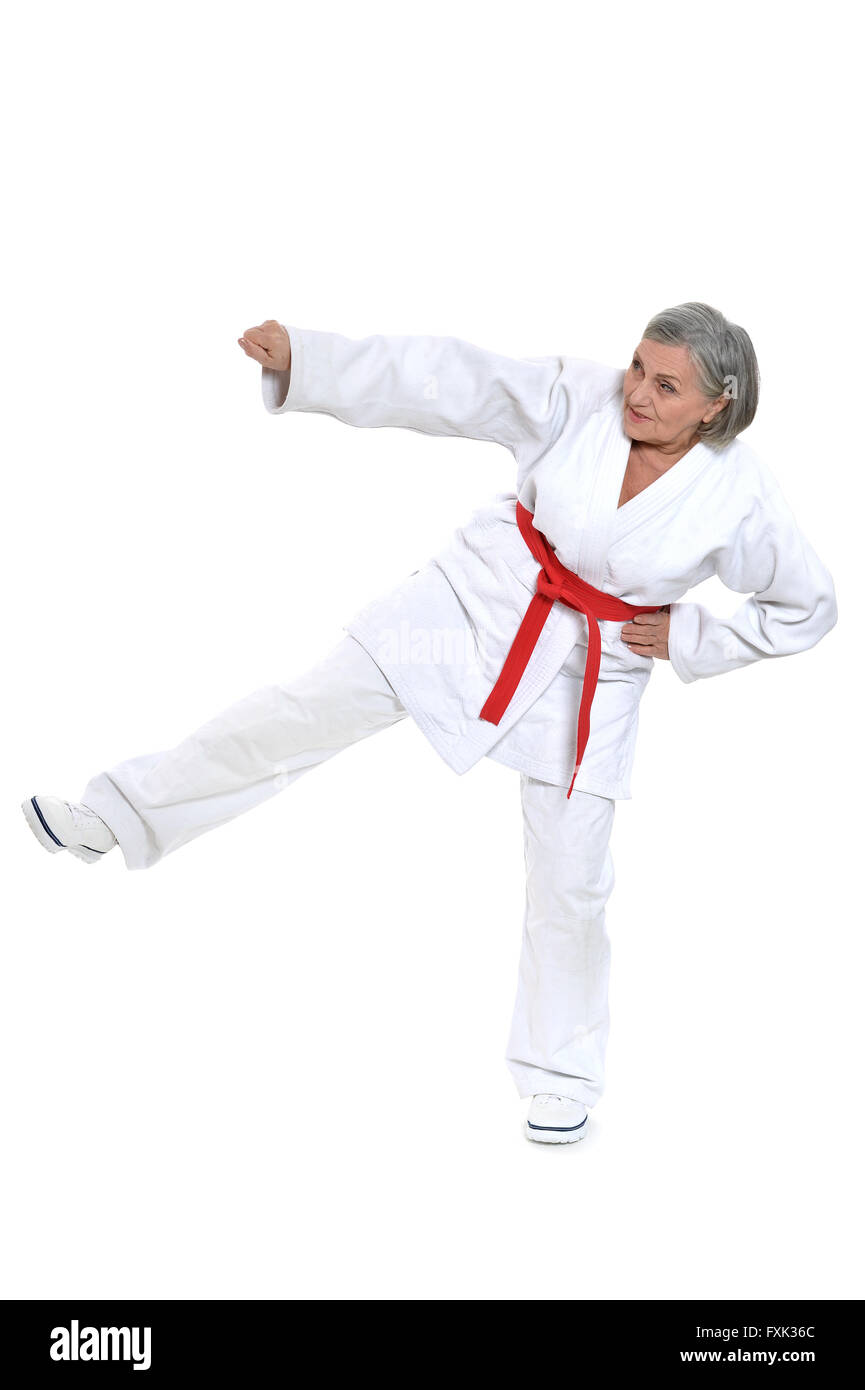 Senior woman in karate pose Stock Photo - Alamy