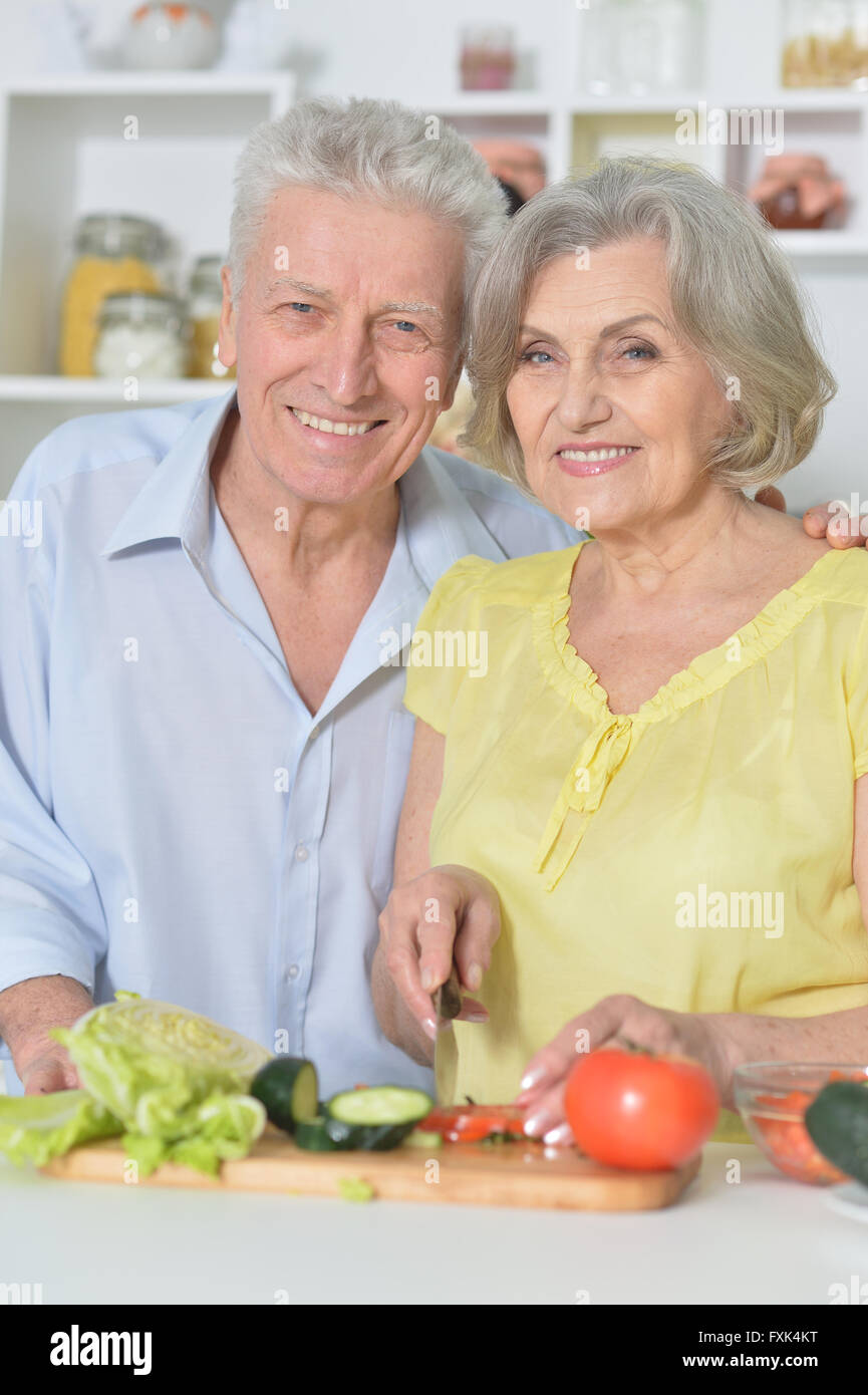senior man and woman in the kitchen Stock Photo - Alamy