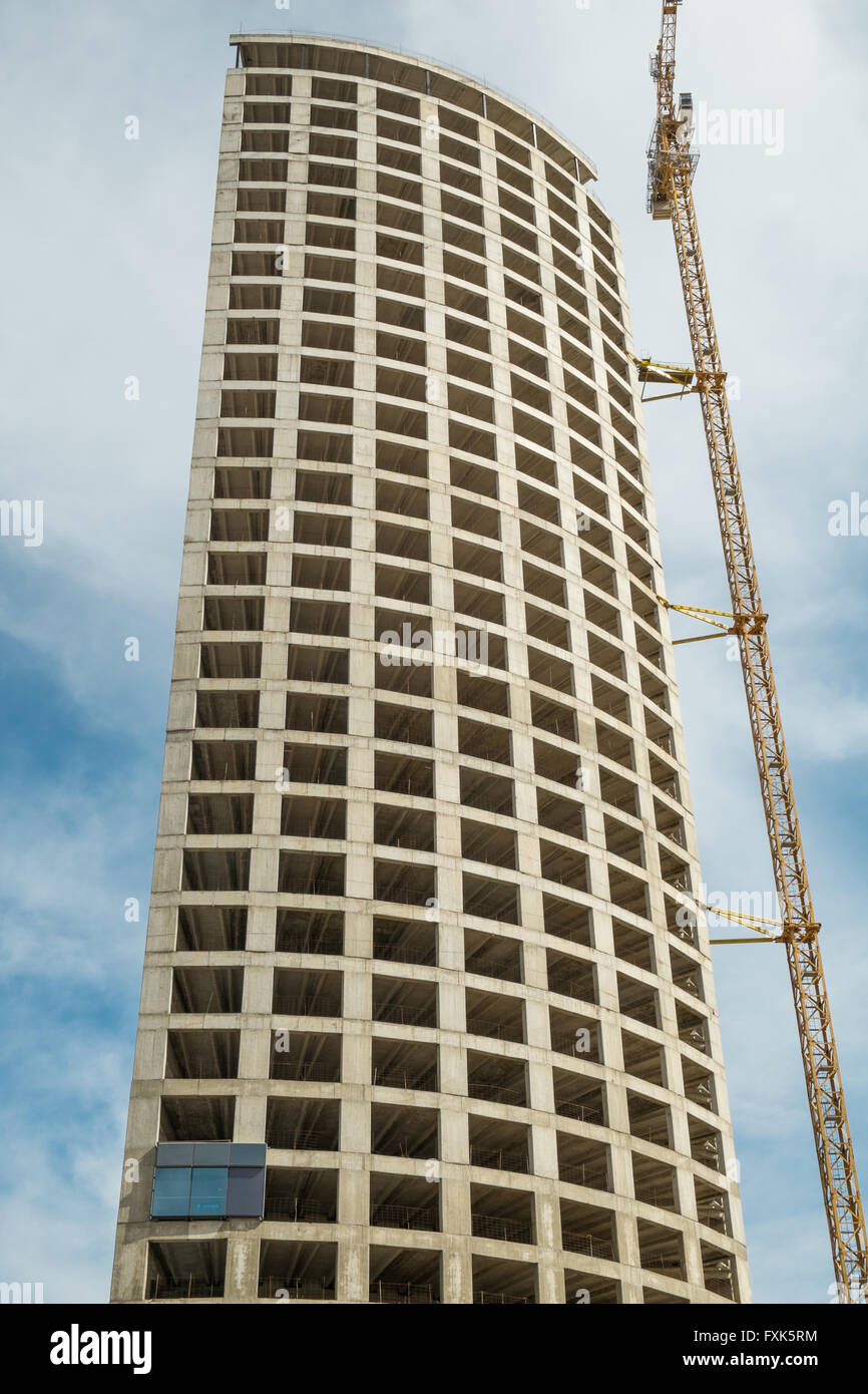 The unfinished structure of a large skyscraper Stock Photo - Alamy