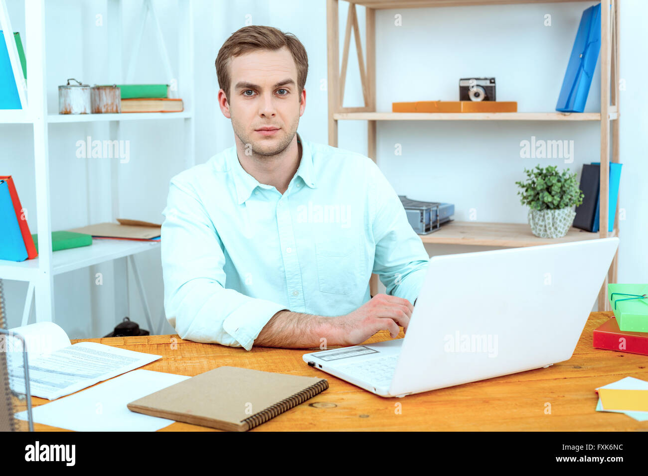 IT programmer working with laptop Stock Photo - Alamy