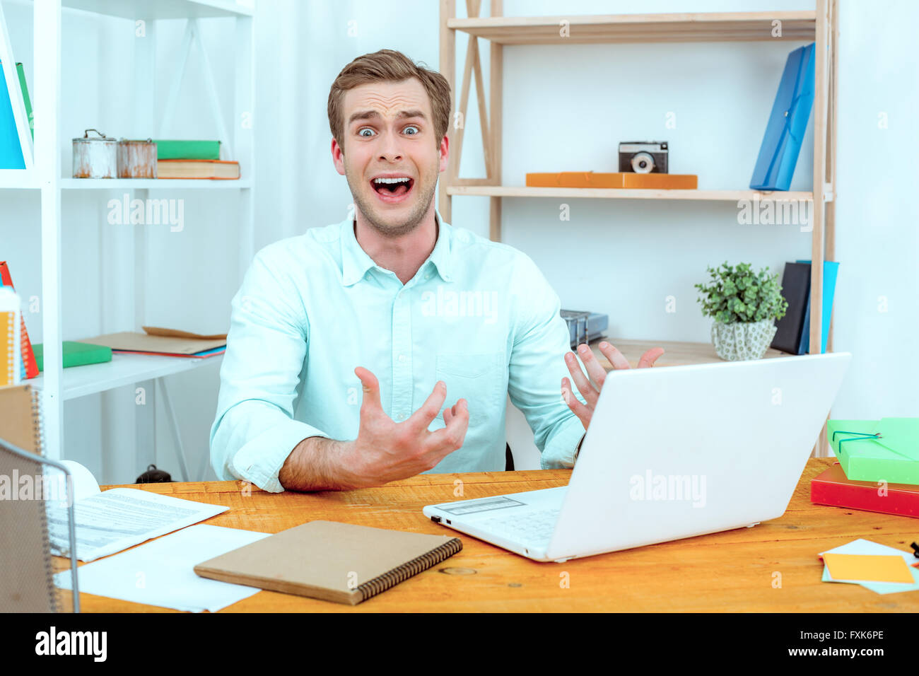 IT programmer working with laptop Stock Photo - Alamy