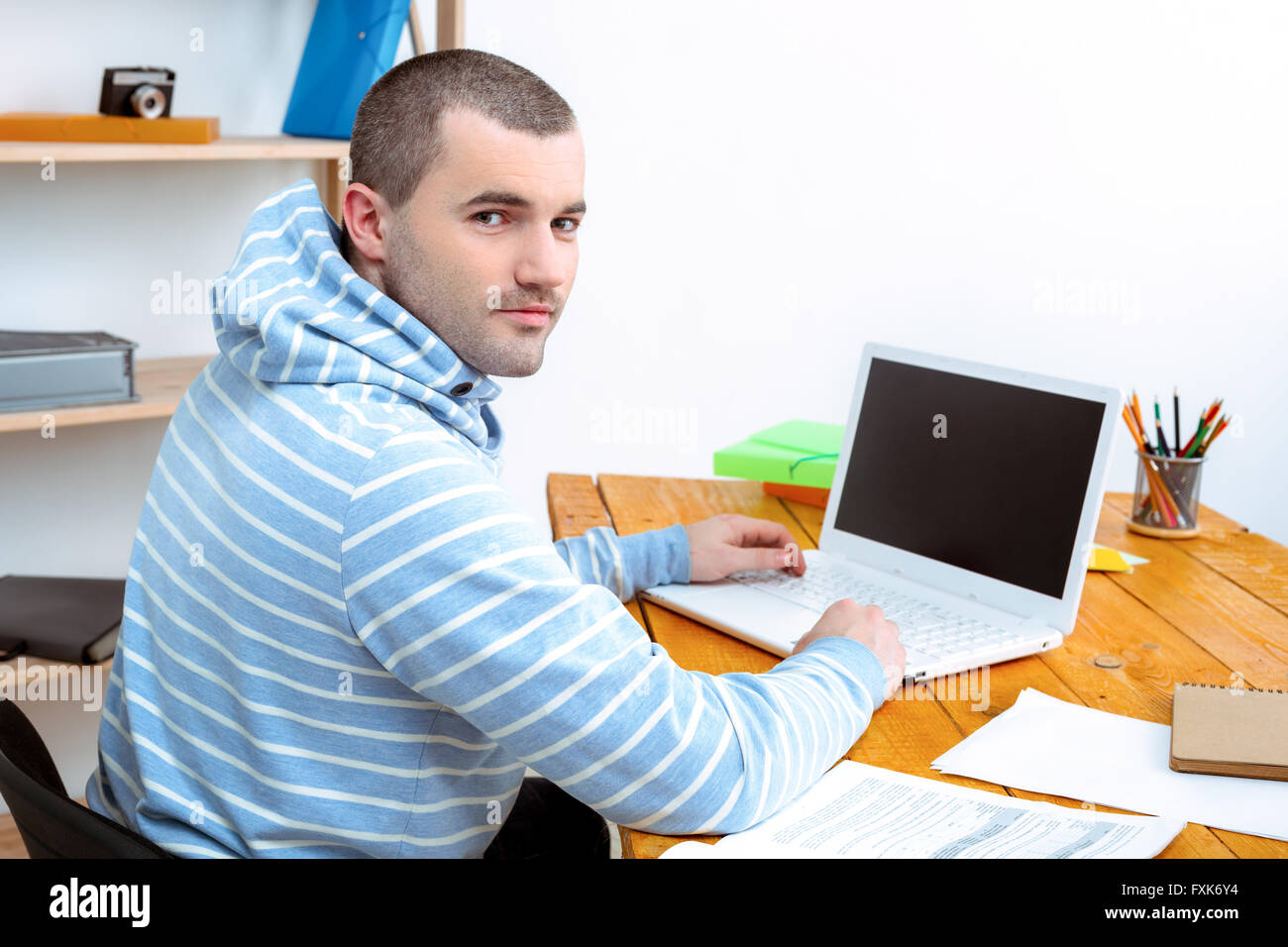 IT programmer working with laptop Stock Photo - Alamy