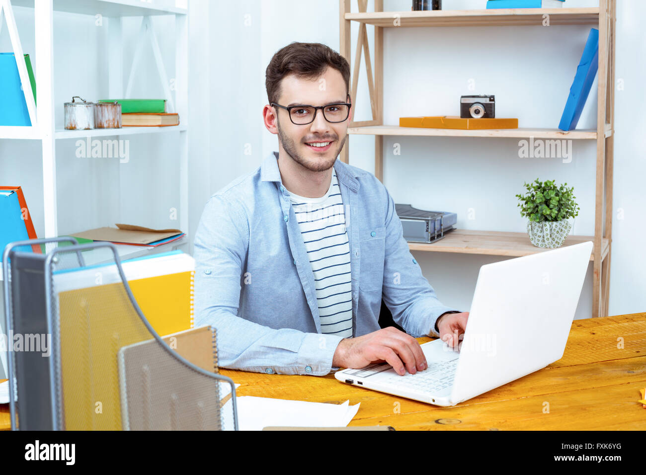 IT programmer working with laptop Stock Photo - Alamy