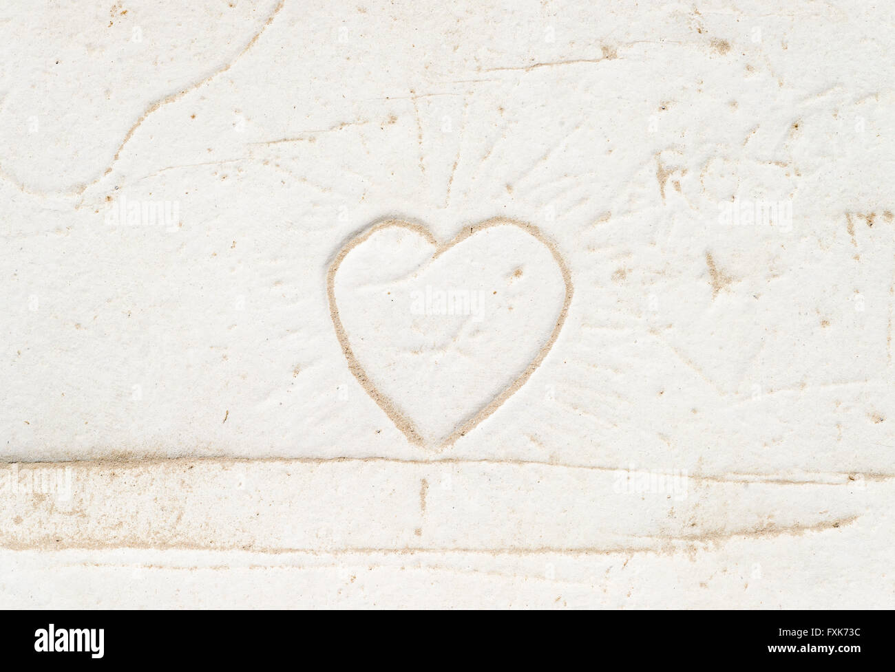Heart incised in stone, rocky coast Scala dei Turchi, rock marl ...