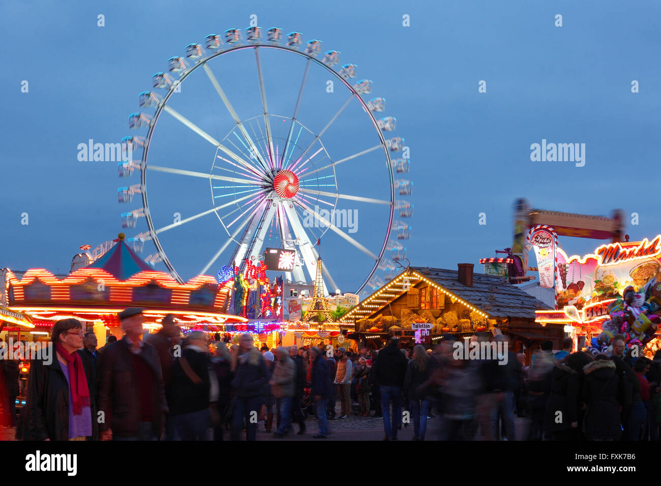 Ferris wheel at dusk, fun fair Bremer Freimarkt, Bremen, Germany Stock ...