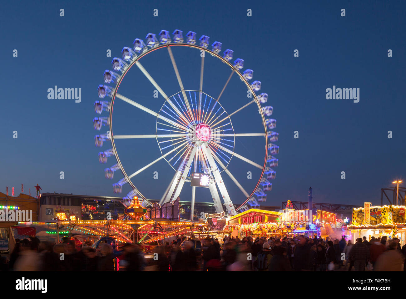 Ferris wheel at dusk, fun fair Bremer Freimarkt, Bremen, Germany Stock ...