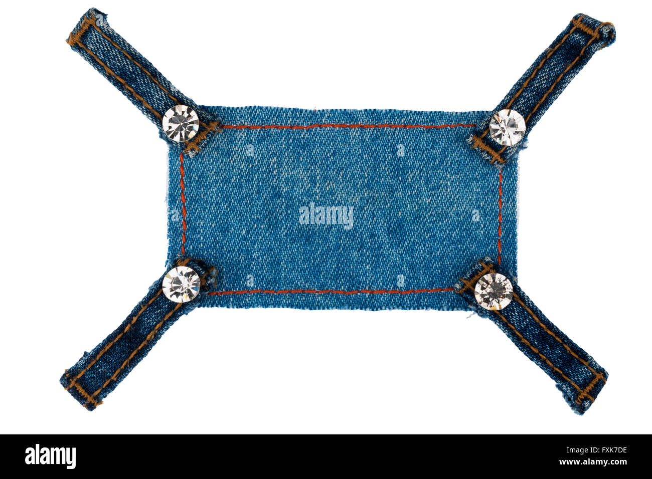 Frame with four straps jeans and rhinestones, lies on the dark denim ...