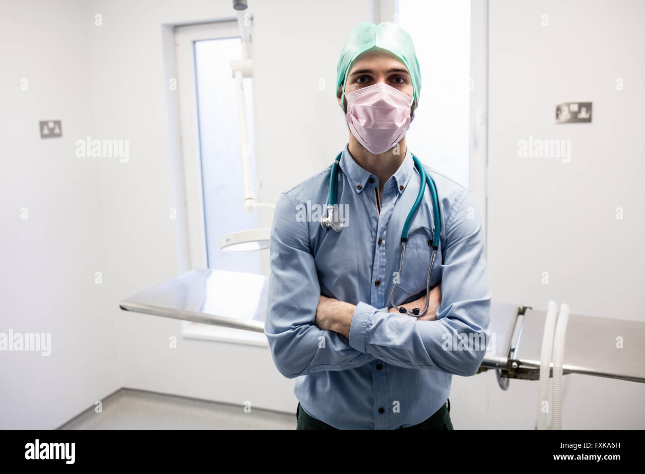 Portrait of Vet standing in clinic Stock Photo - Alamy