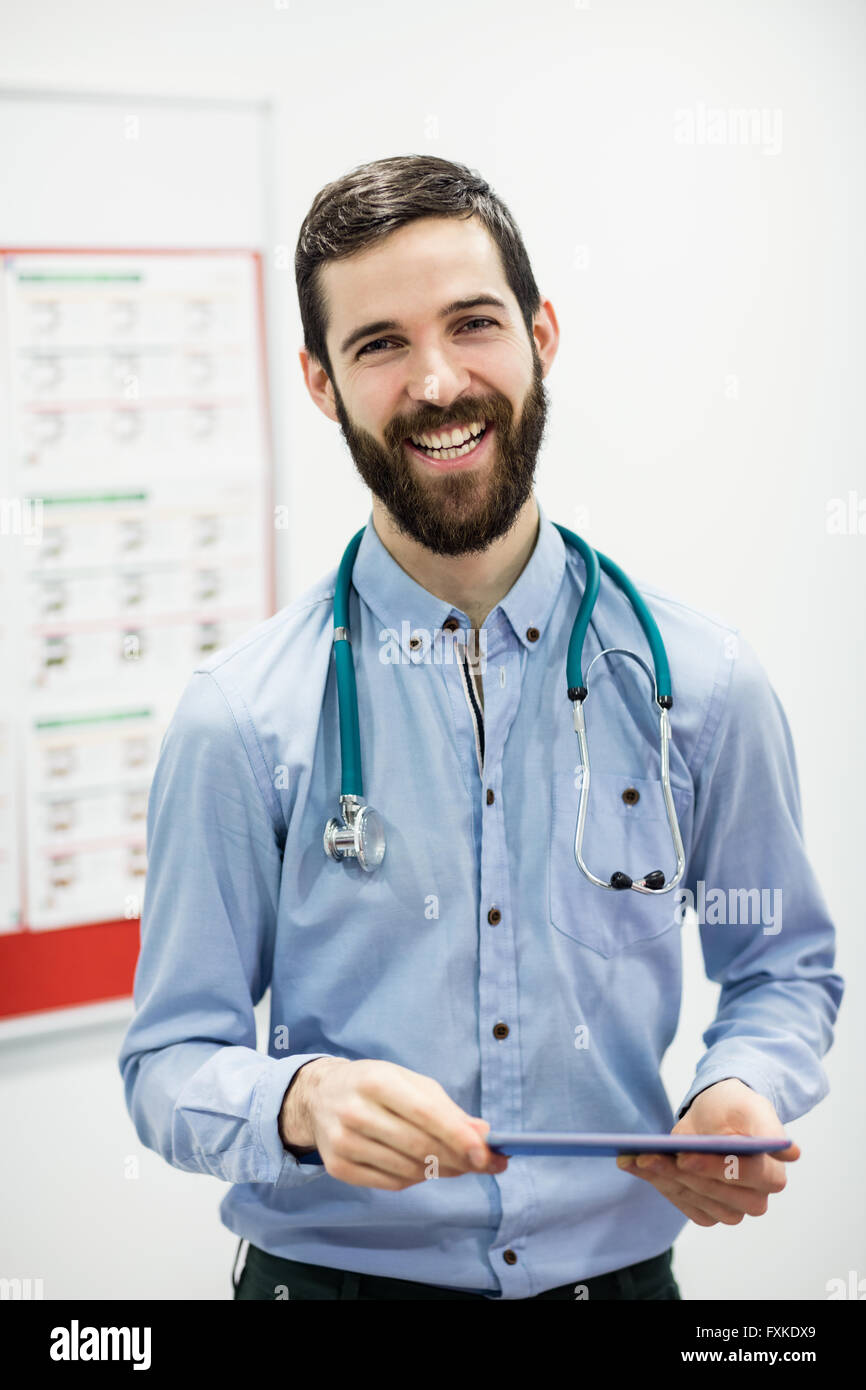Portrait male doctor browsing internet hi-res stock photography and ...