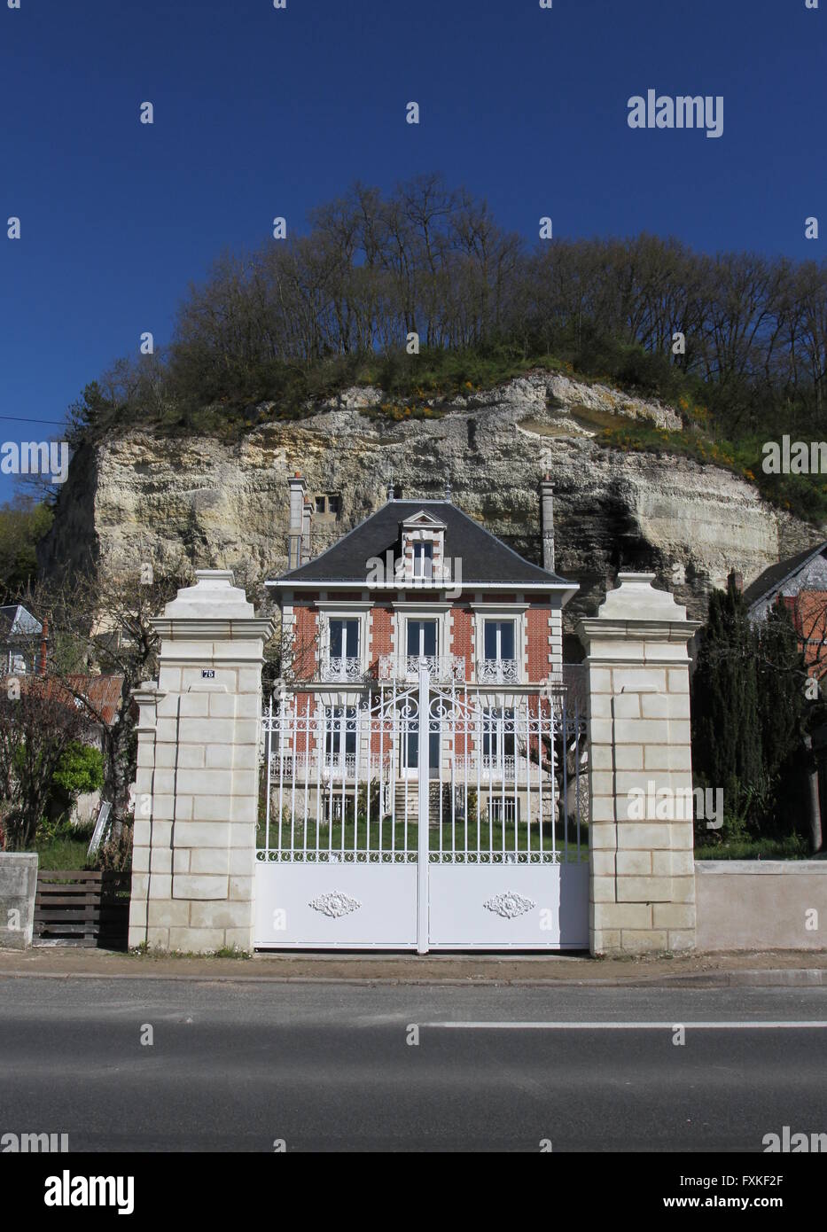 House with Troglodyte houses in cliffsRochecorbon France April 2016 ...