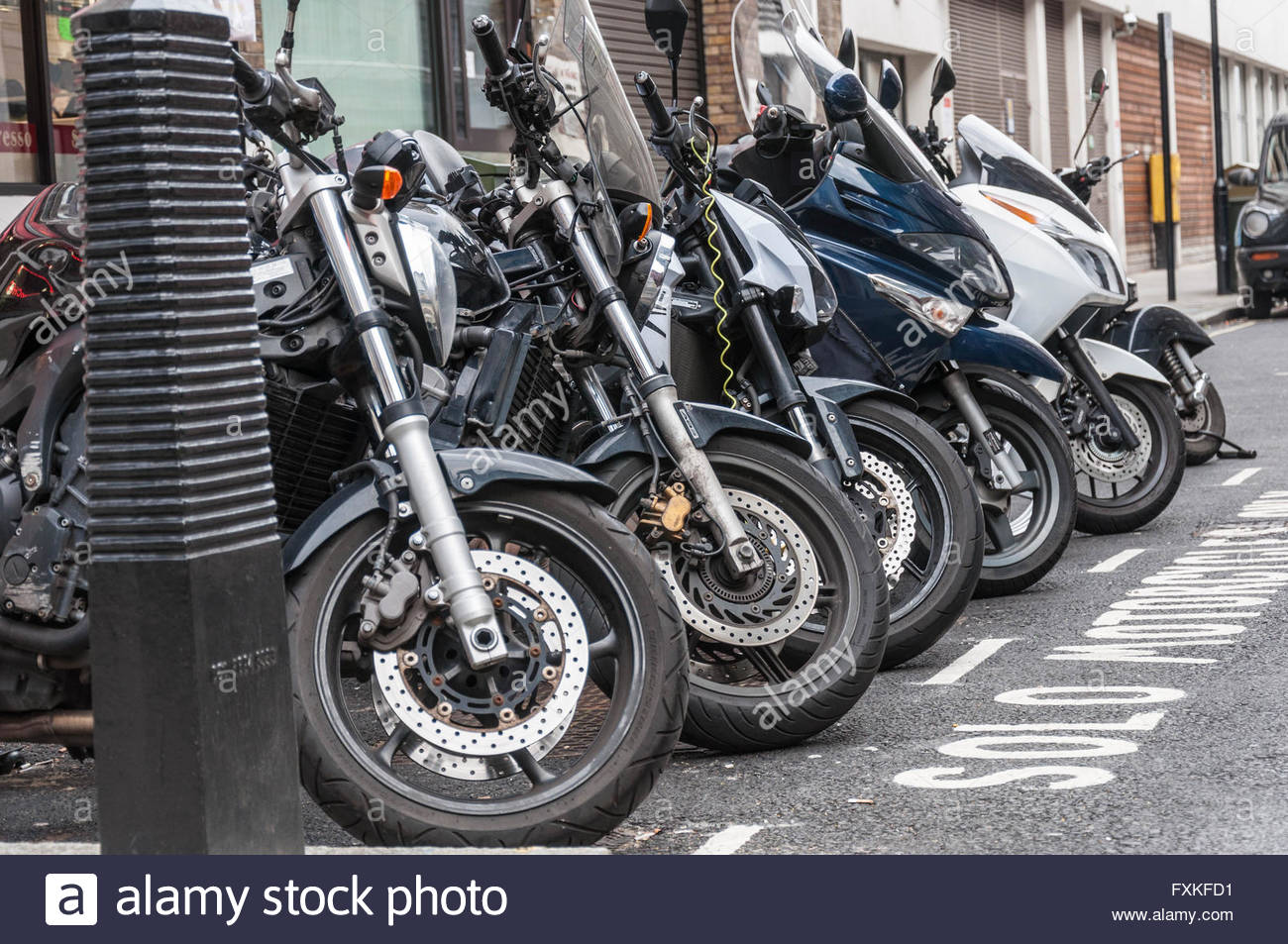 Parked Motorcycles High Resolution Stock Photography and Images - Alamy
