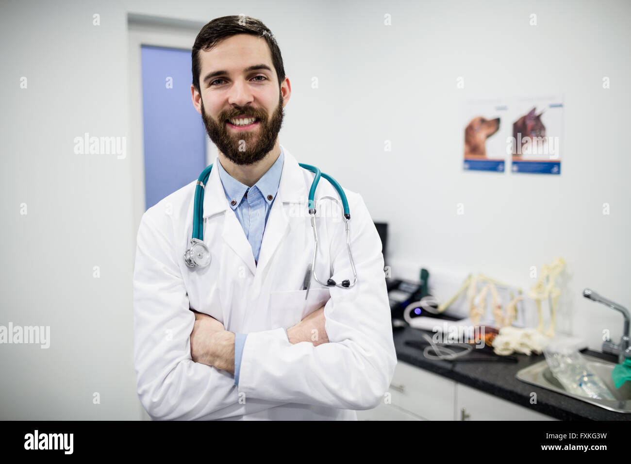 Portrait of smiling vet Stock Photo - Alamy
