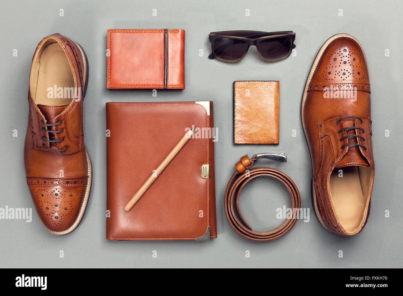 Top view of brown man accessories Stock Photo - Alamy