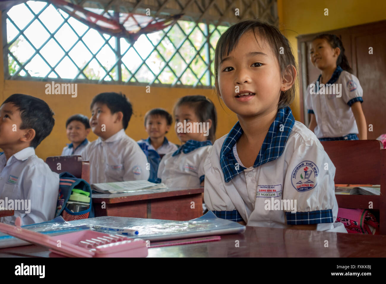 School children in school uniform learning in a small village school on ...