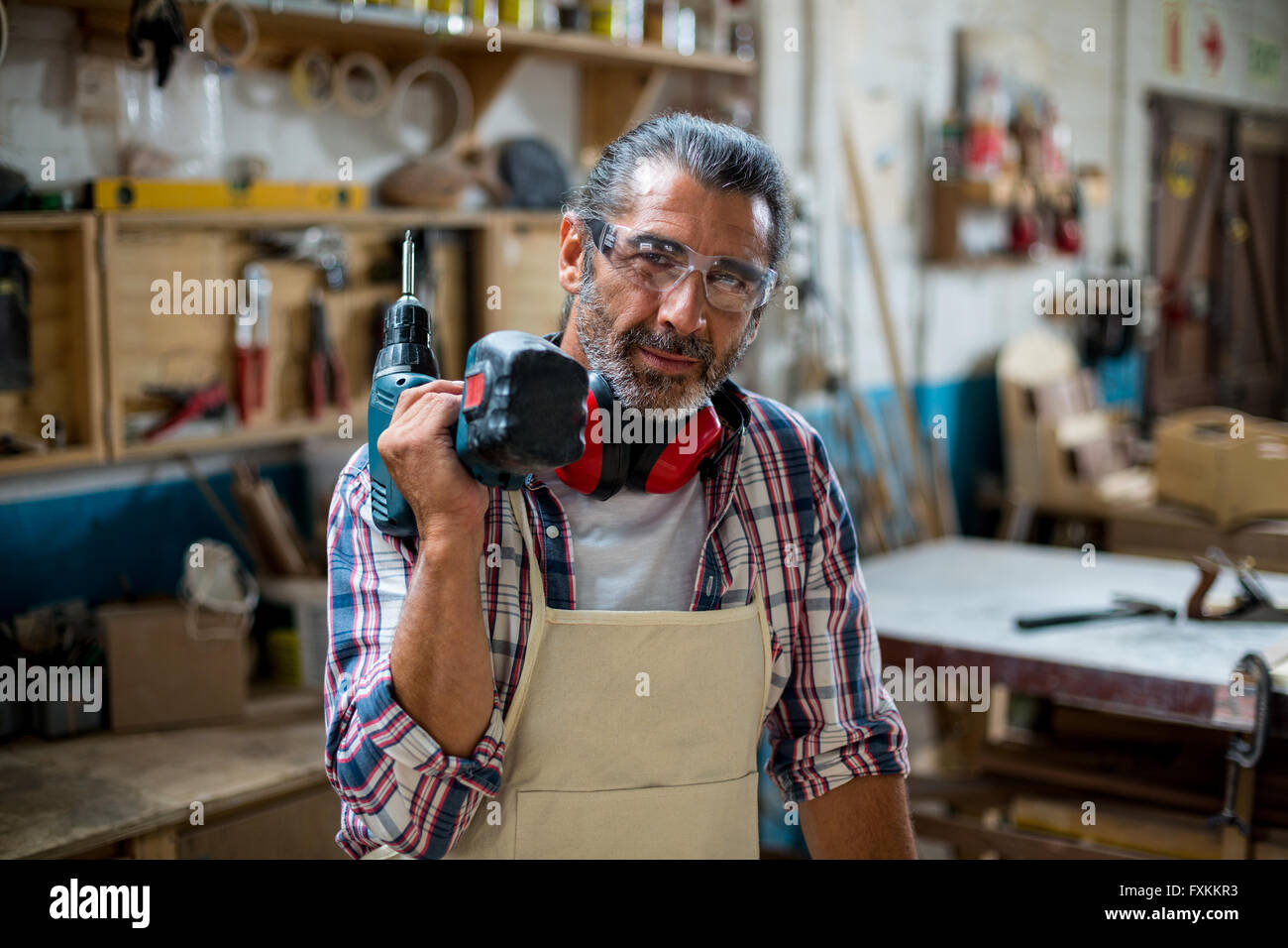 Man work machine drill hi-res stock photography and images - Alamy
