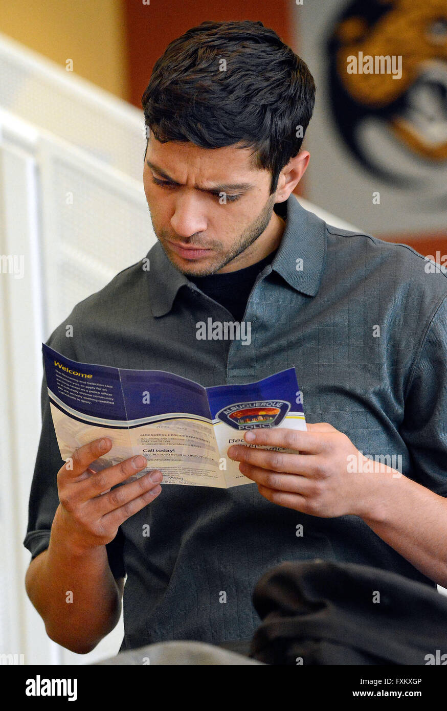 Albuquerque, NM, USA. 16th Apr, 2016. Michael Fahey looks over a APD ...