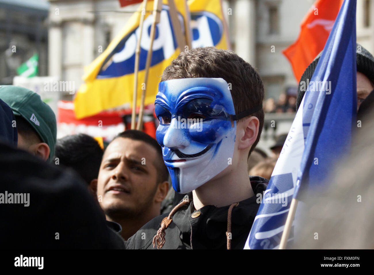 London, England. 16 April 2016. A protestor in a blue Anonymous face ...
