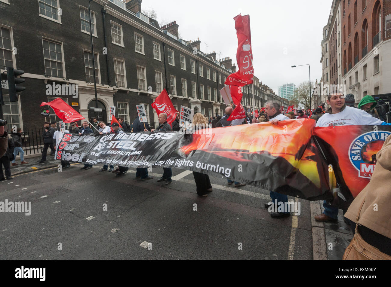 London, UK. 16th April, 2016. A giant banner across the full width of ...