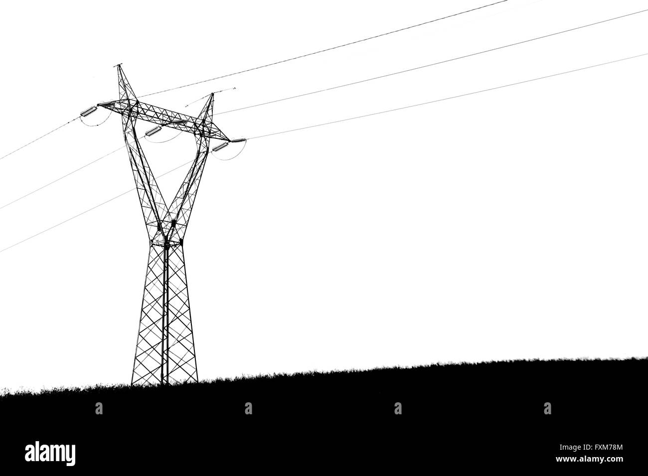 Electricity pylon and grass Black and White Stock Photos & Images - Alamy