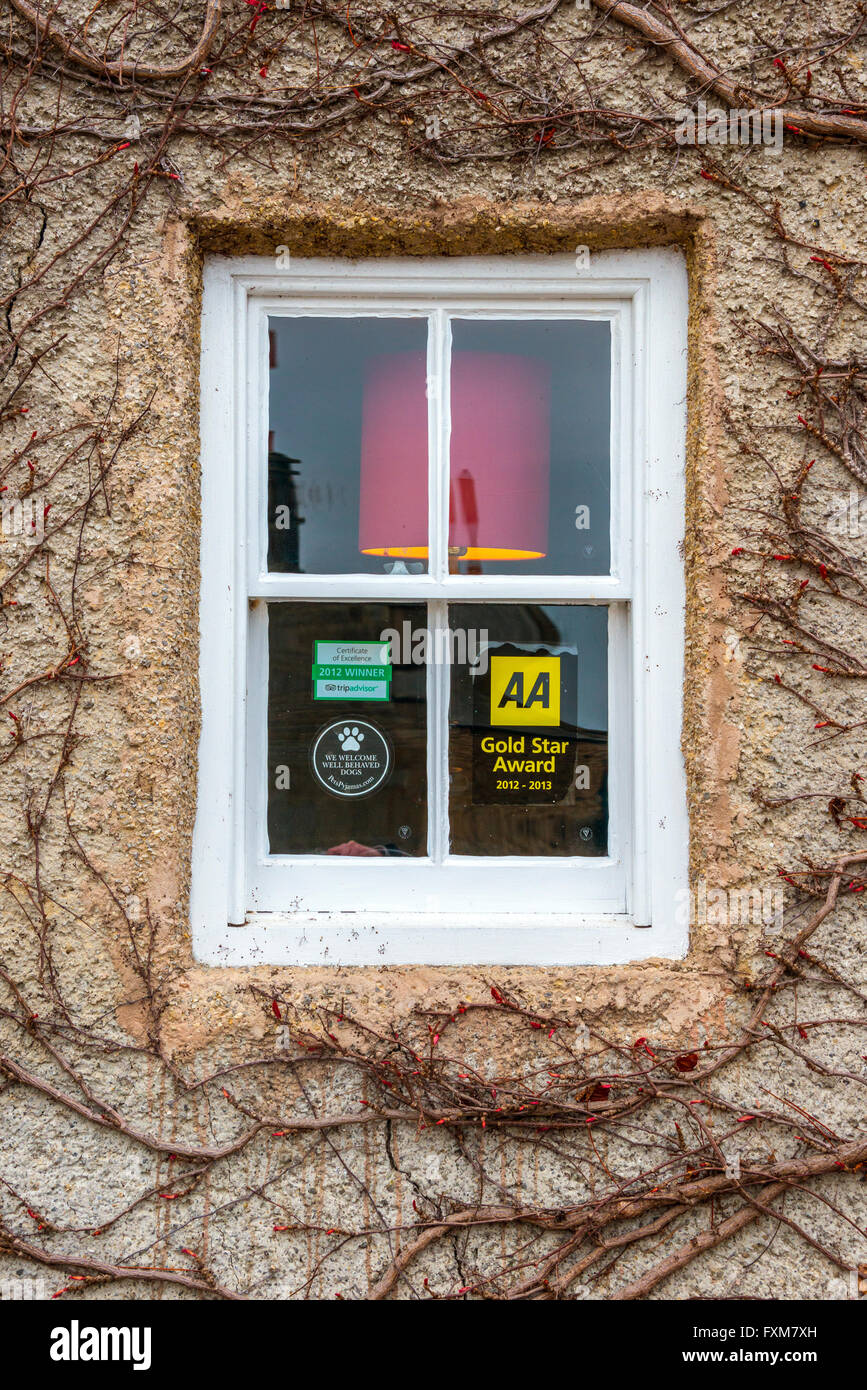 Pub Window displaying AA Gold Star Award Sign Stock Photo - Alamy