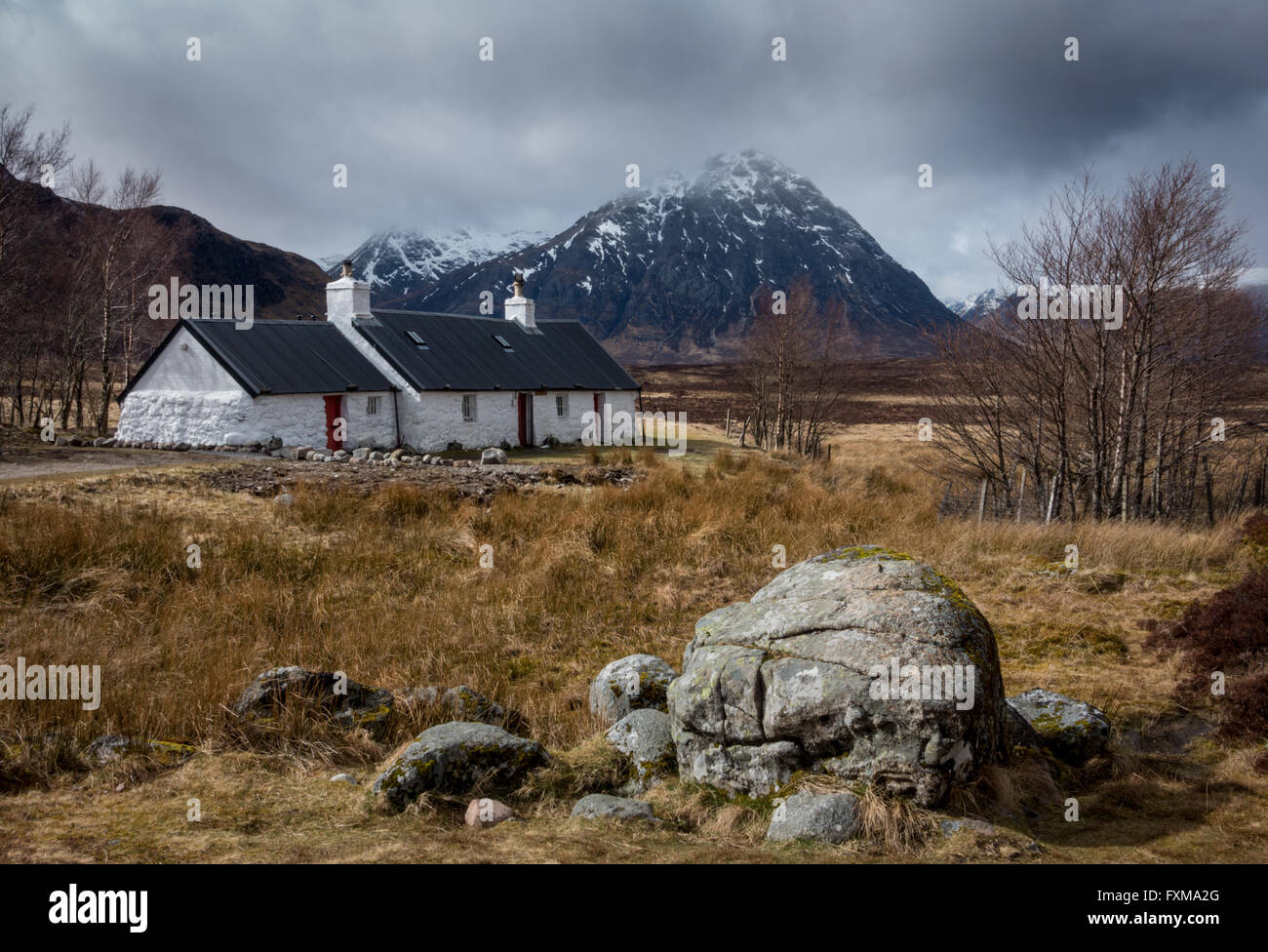 Black rock cottage Stock Photo - Alamy