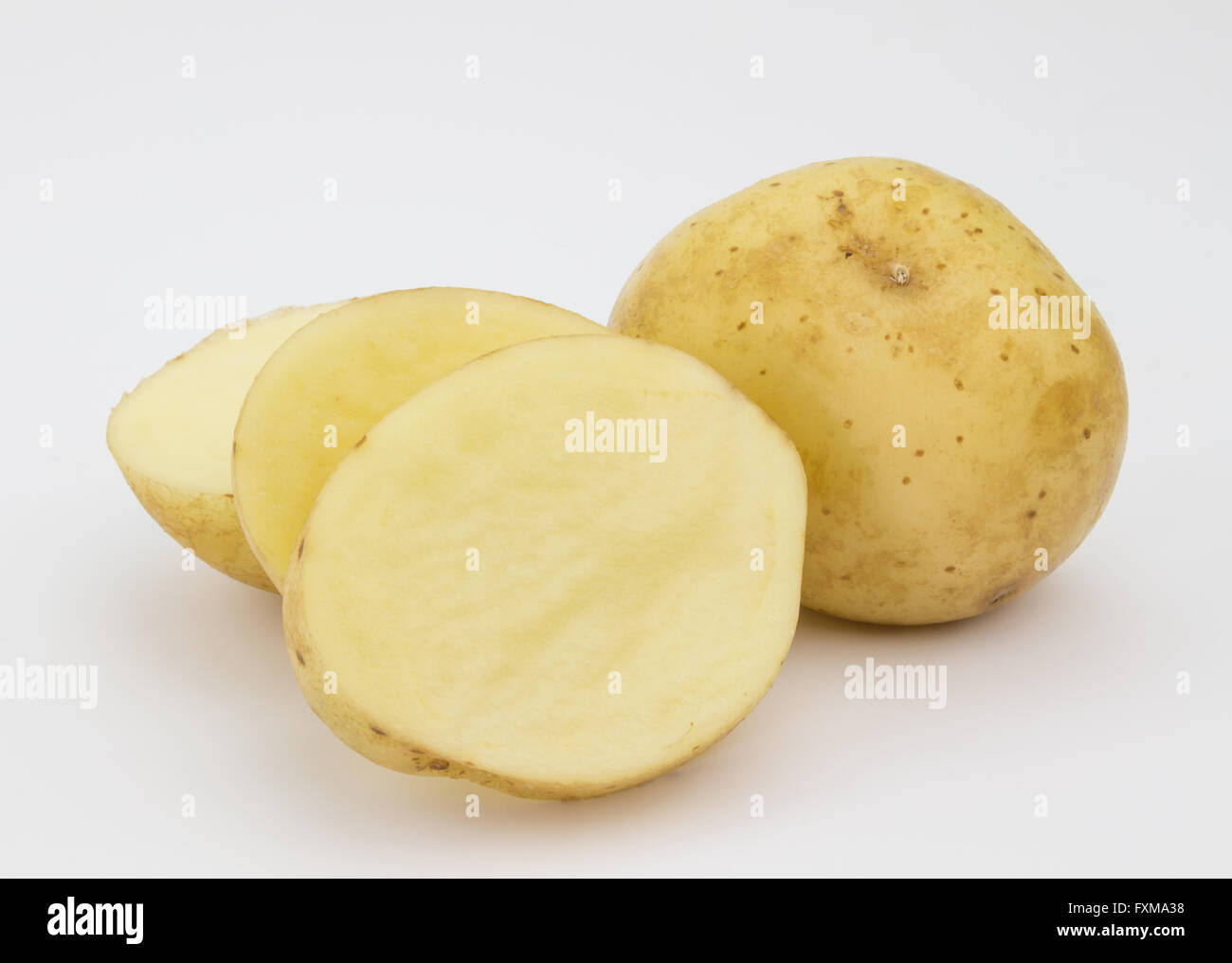 Photo of single potato and one sliced isolated on white Stock Photo - Alamy
