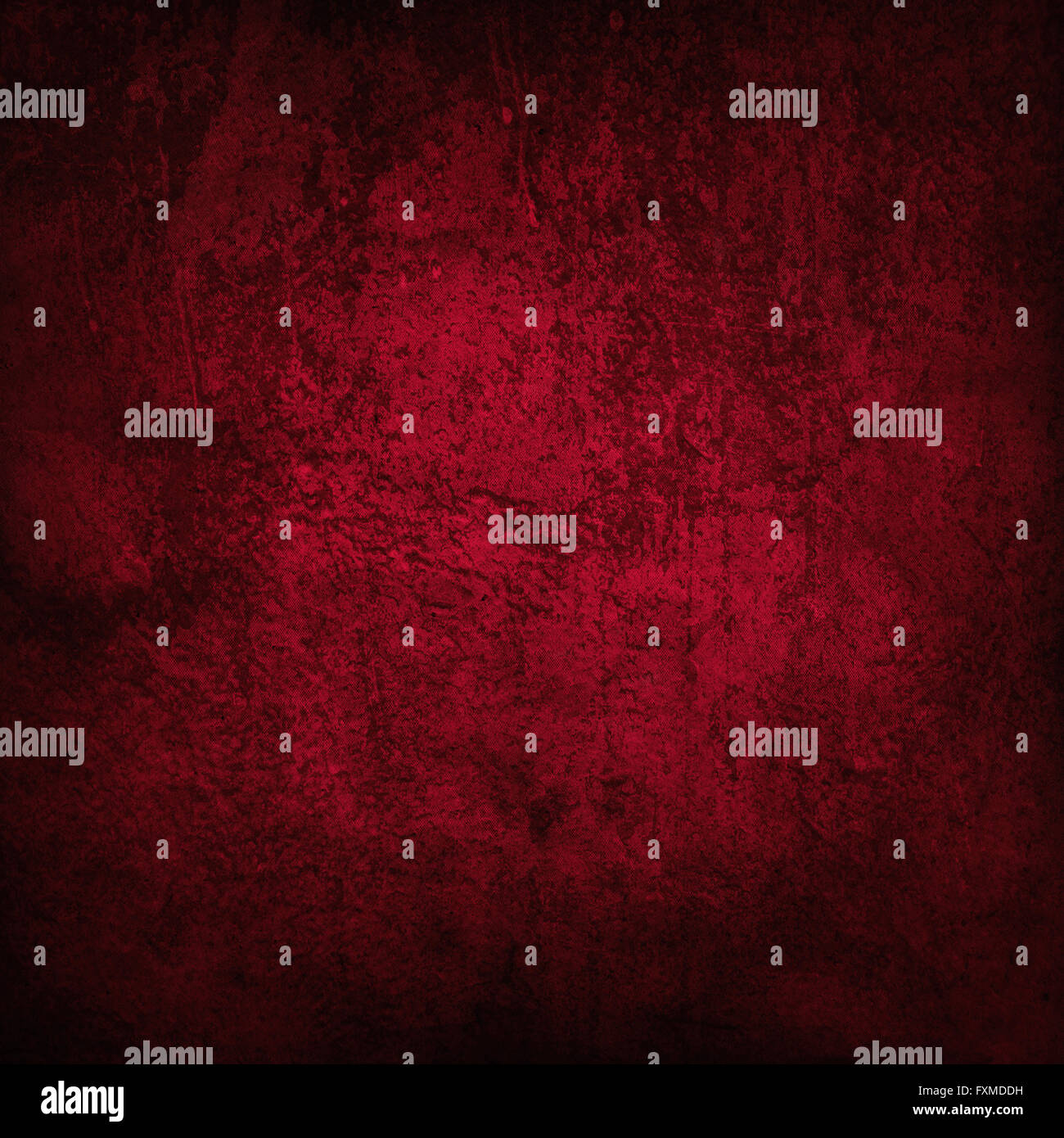 Abstract red background or paper with bright center spotlight and dark ...