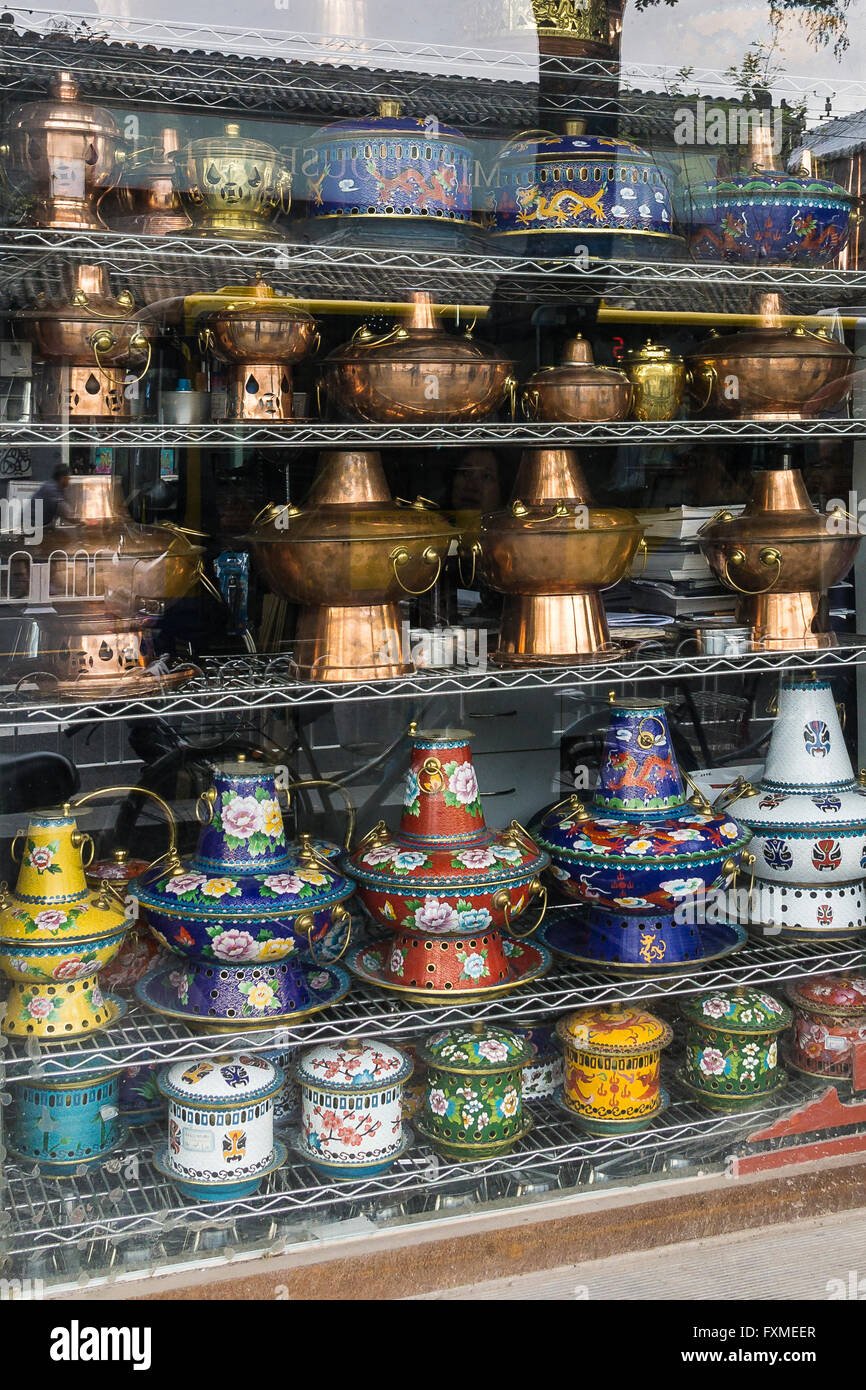 Steam pots on shelves at a restaurant Stock Photo - Alamy