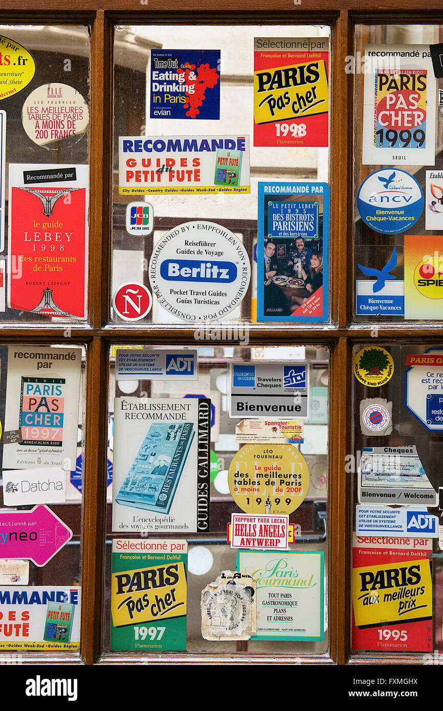 Travel Guides Sticker on Window, Paris, France Stock Photo - Alamy