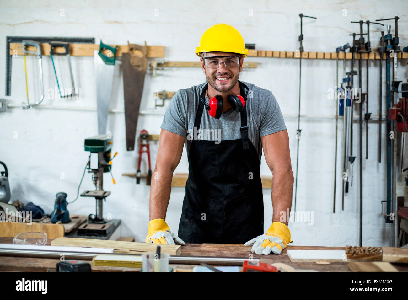 Portrait of carpenter standing in workshop Stock Photo - Alamy