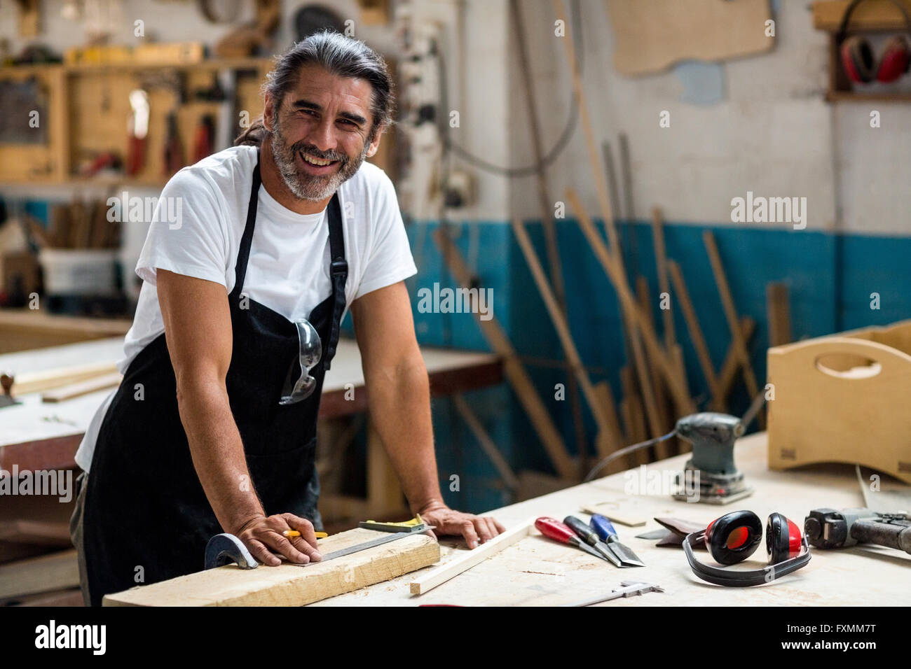 Happy mature male carpenter hi-res stock photography and images - Alamy