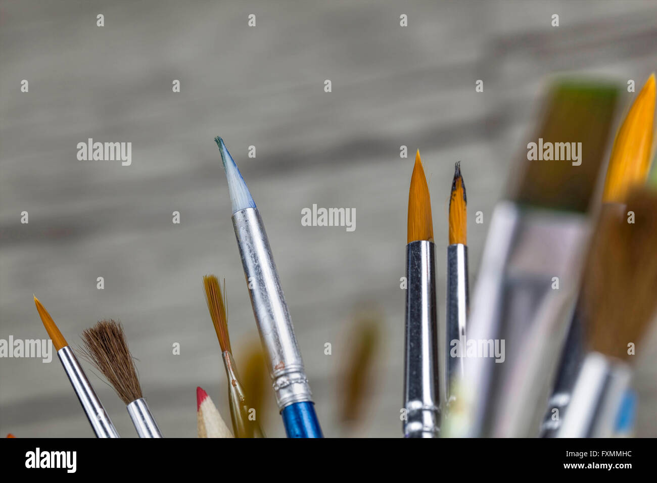Close up of artist used paint brushes Stock Photo - Alamy