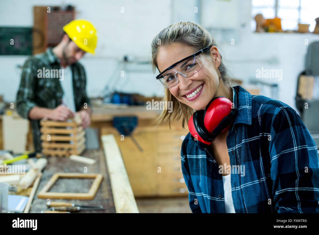 Portrait of female carpenter Stock Photo - Alamy