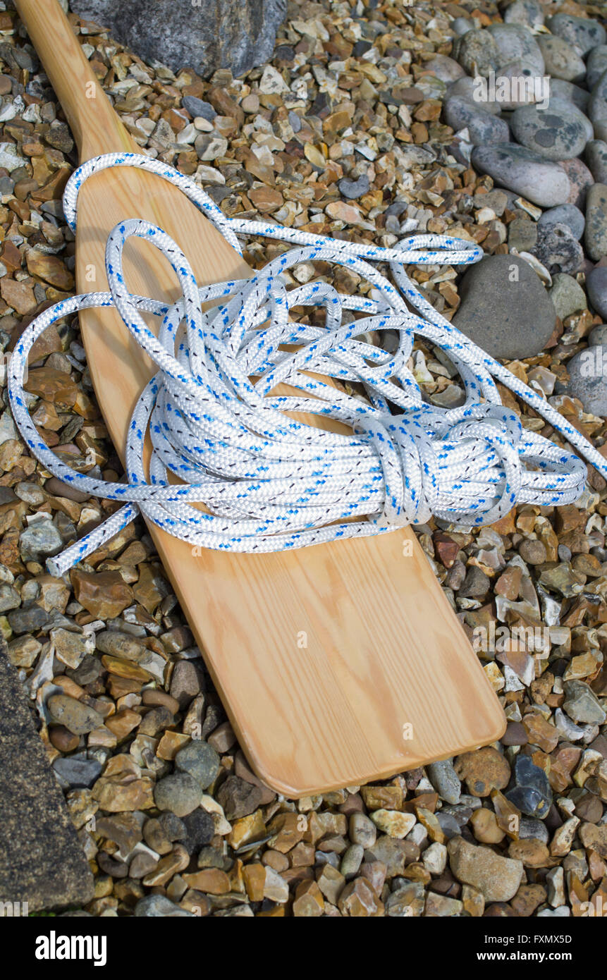 Wooden Oar With Rope Stock Photo - Alamy