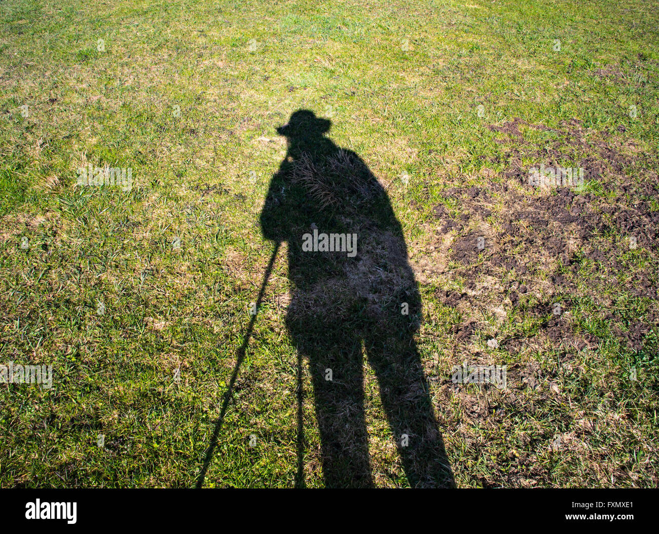 amazing photographer's shadow on the farm floor Stock Photo - Alamy