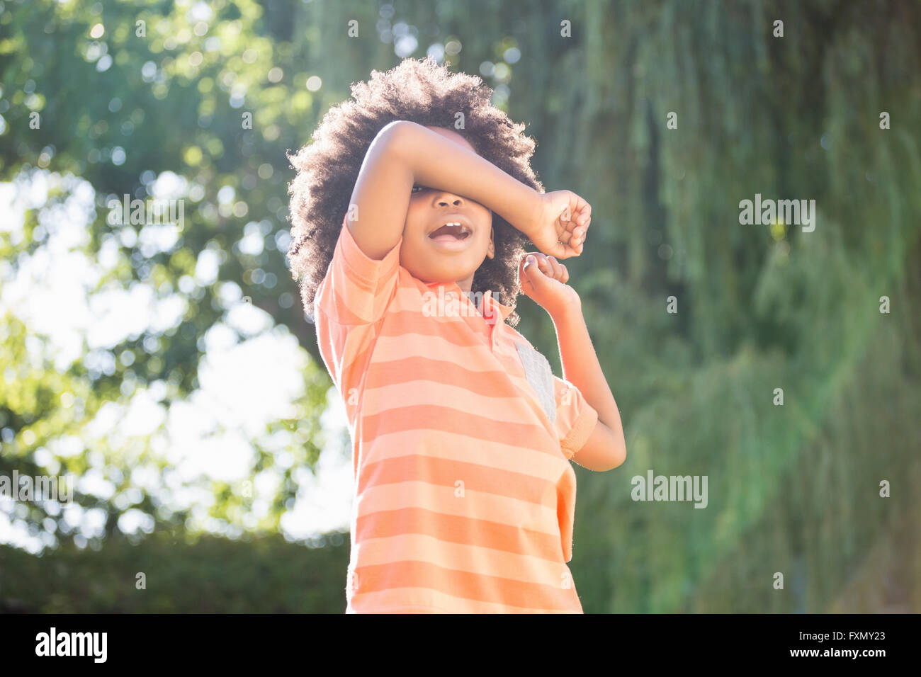 Hiding behind hair hi-res stock photography and images - Alamy