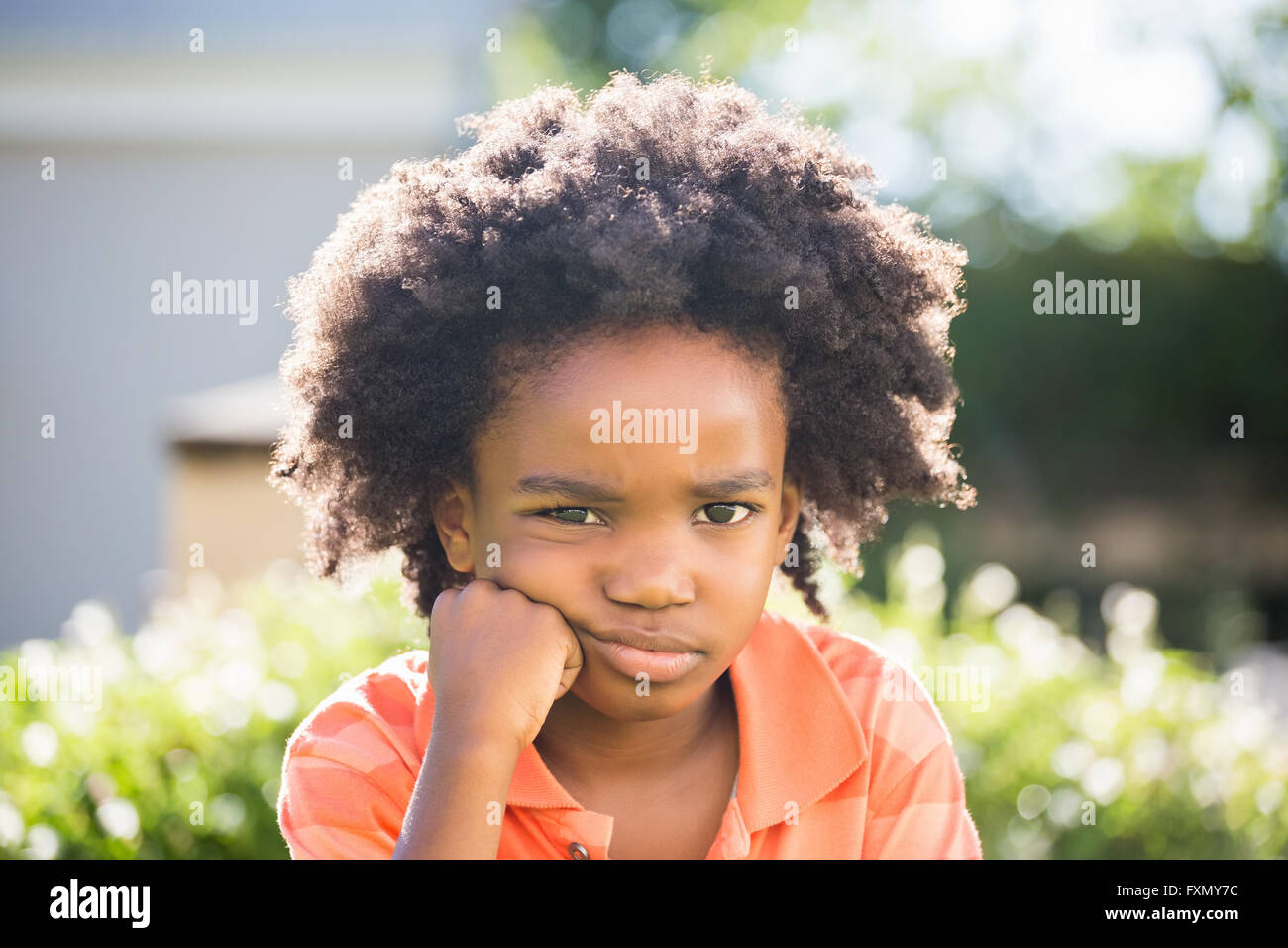 Boy is feeling sad outside Stock Photo - Alamy