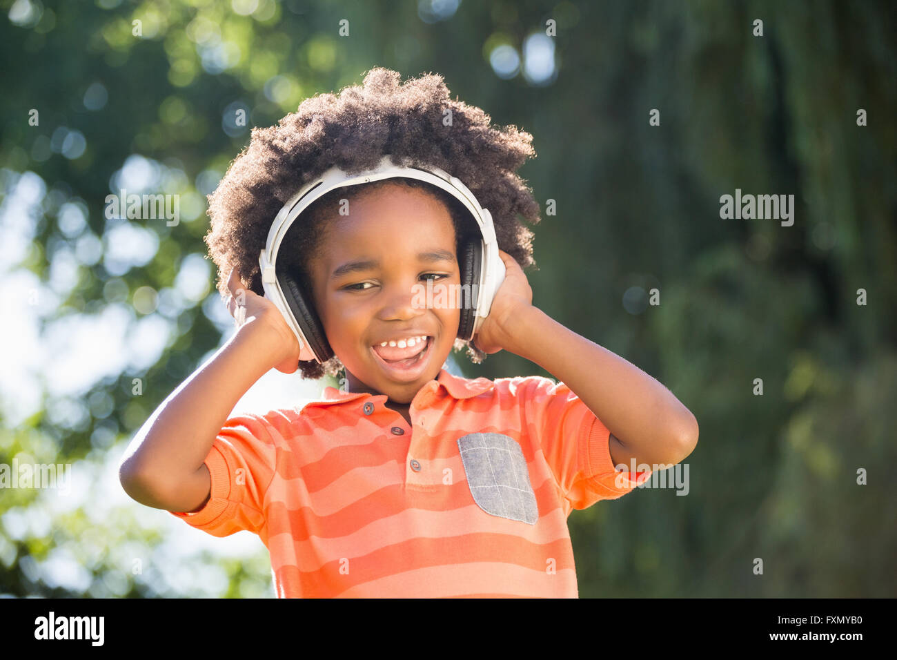 Boy is listening music Stock Photo - Alamy
