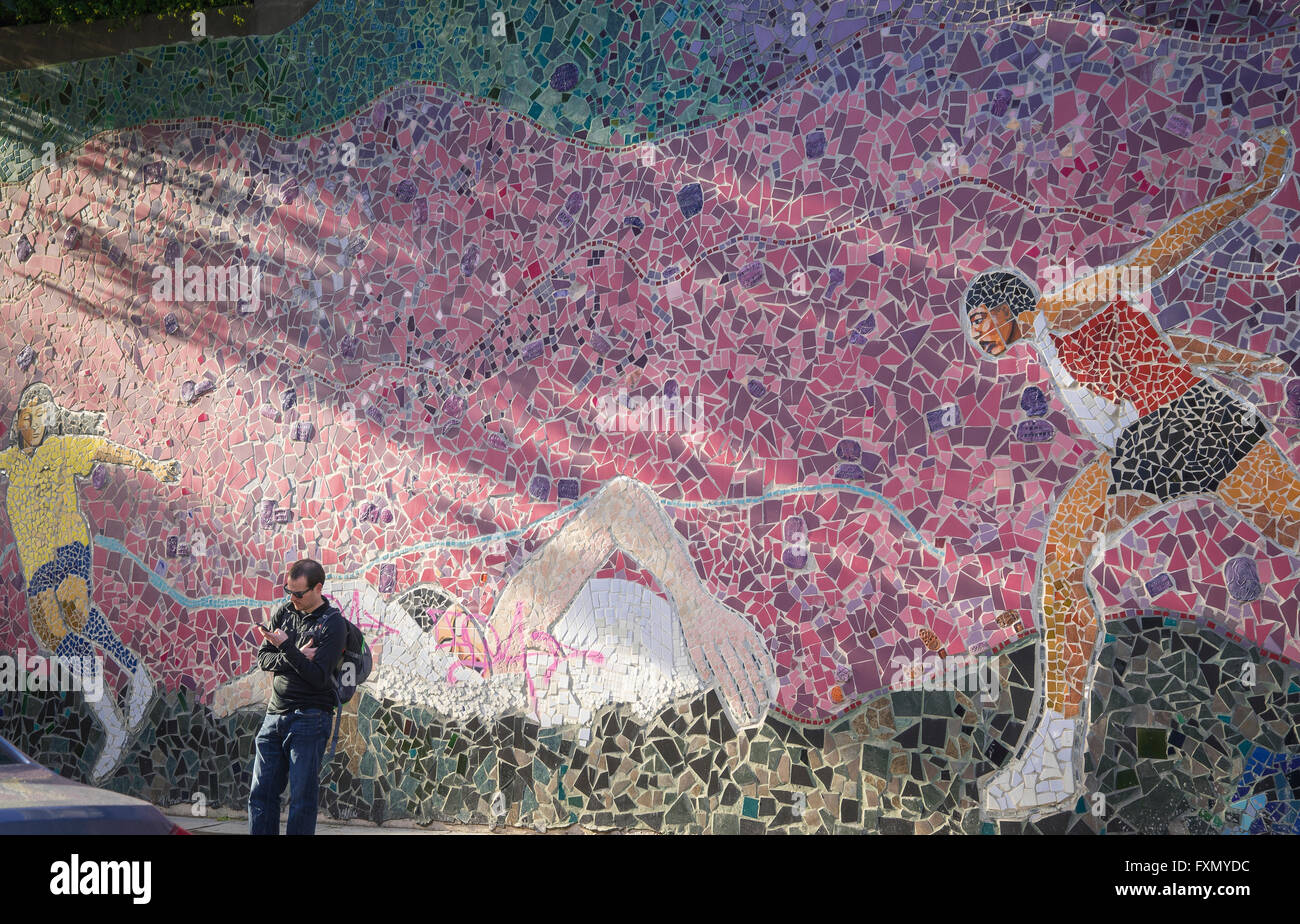 Mural of running man in California Stock Photo - Alamy