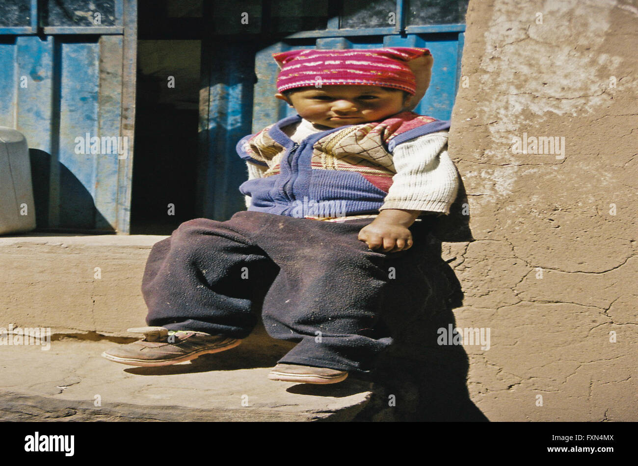 Peruvian boy dressed in colourful traditional handmade outfit Stock ...