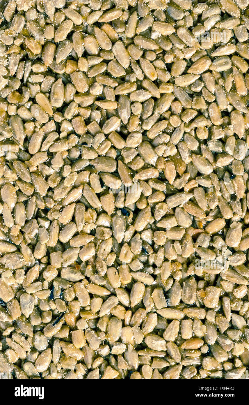 poured by syrup sunflower seeds Stock Photo - Alamy