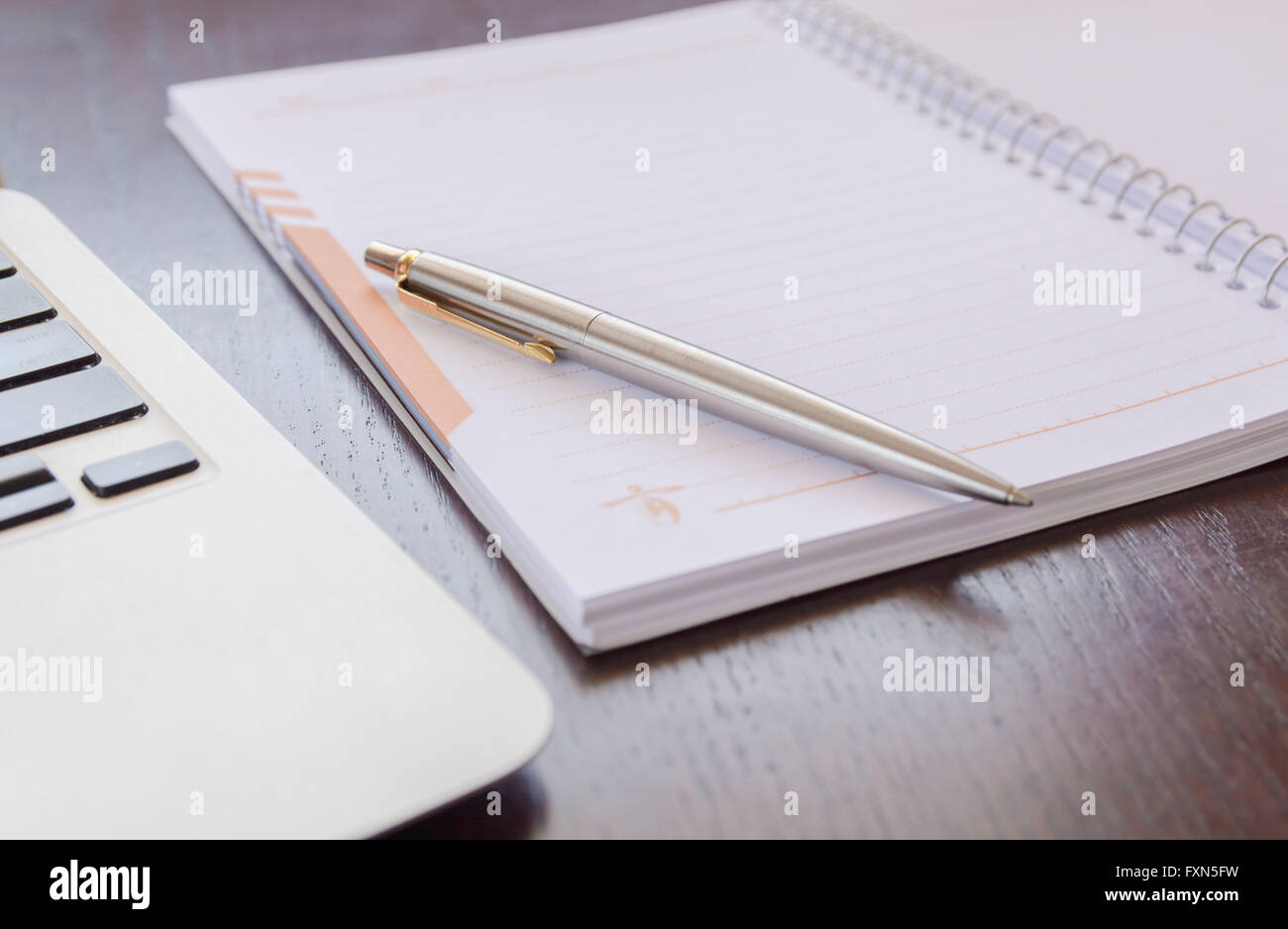 Pc notepad on wooden table top view with copy space hi-res stock ...