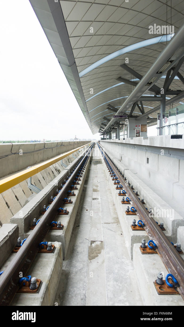 The rail installation on the concrete sleeper at metro construction ...