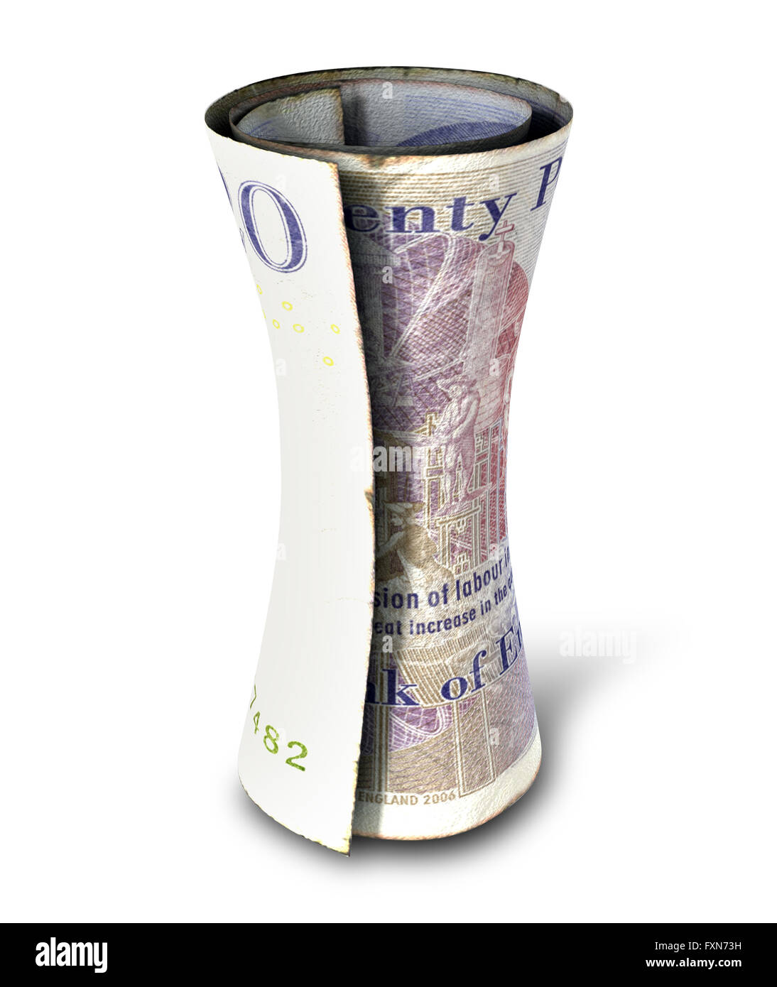 A regular rolled british pound bank note on an isolated white studio ...