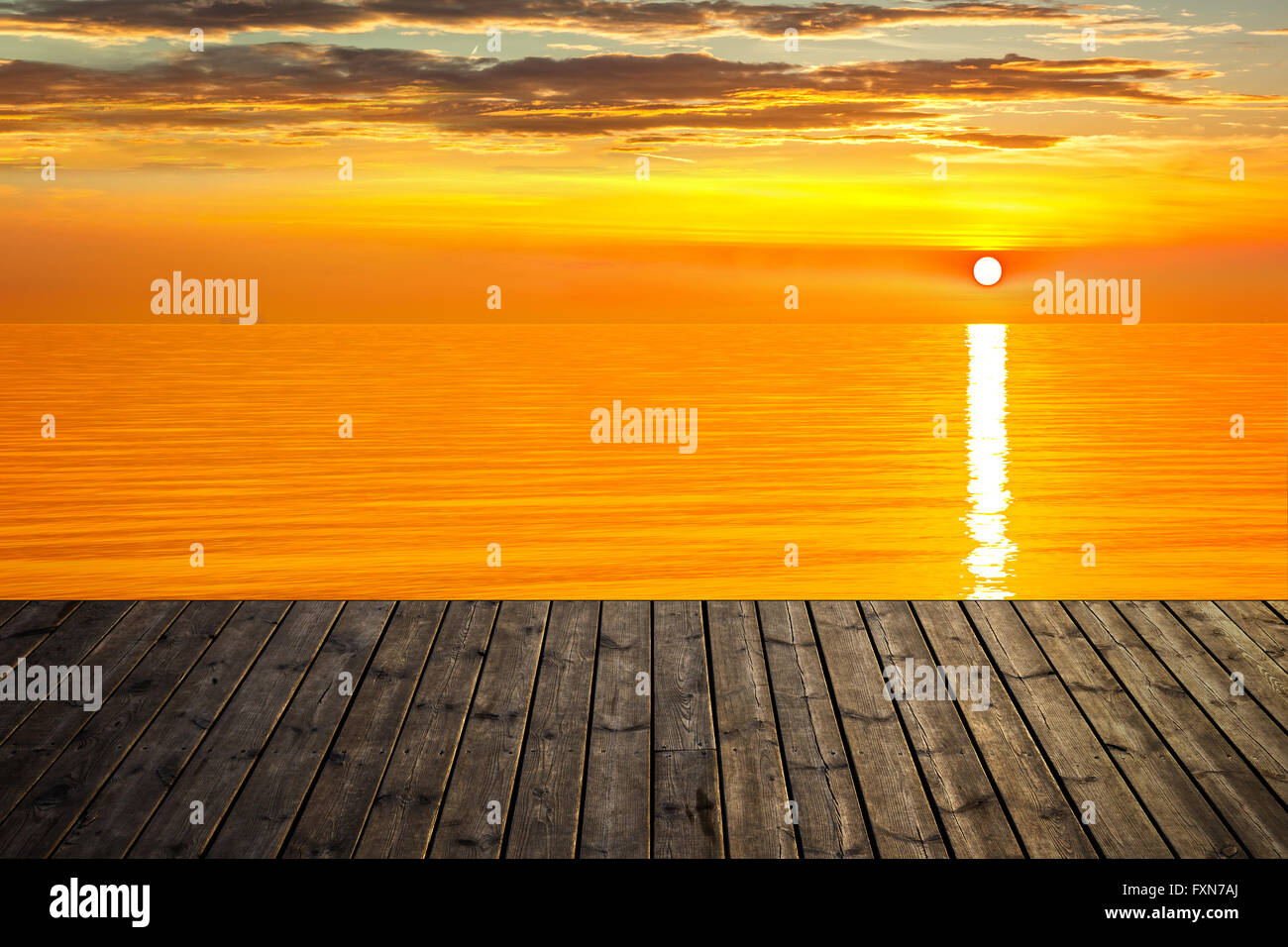 Sunset background with empty plank and sea Stock Photo - Alamy