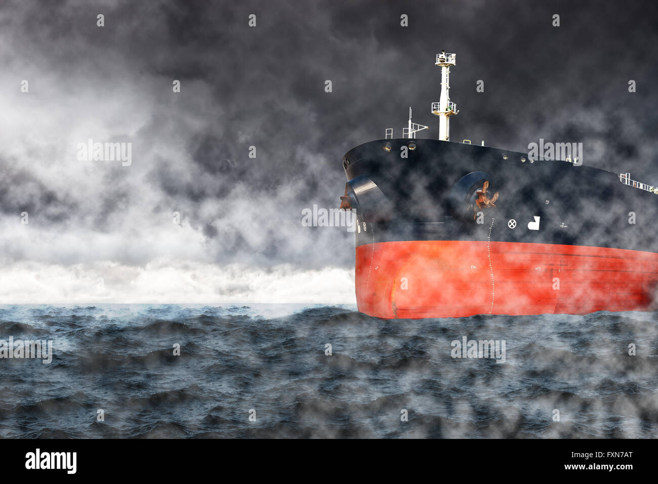 Cargo ship at sea during a storm Stock Photo - Alamy
