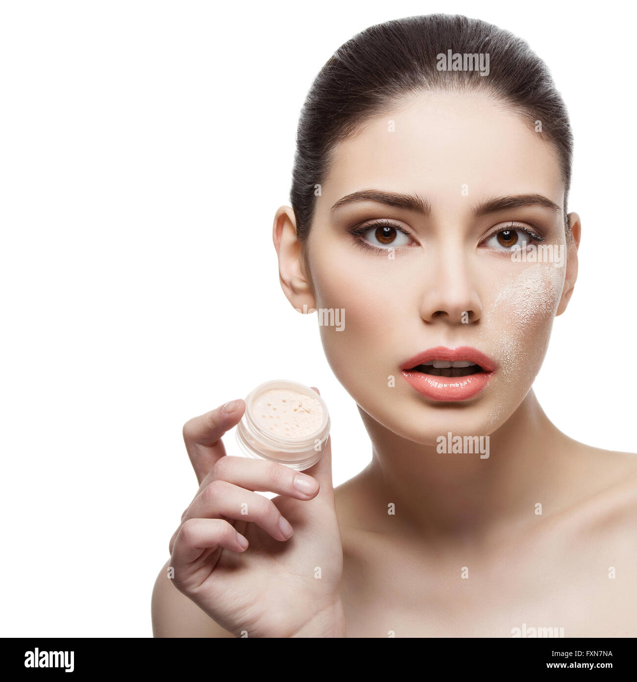 Beautiful girl holding jar with loose powder Stock Photo - Alamy
