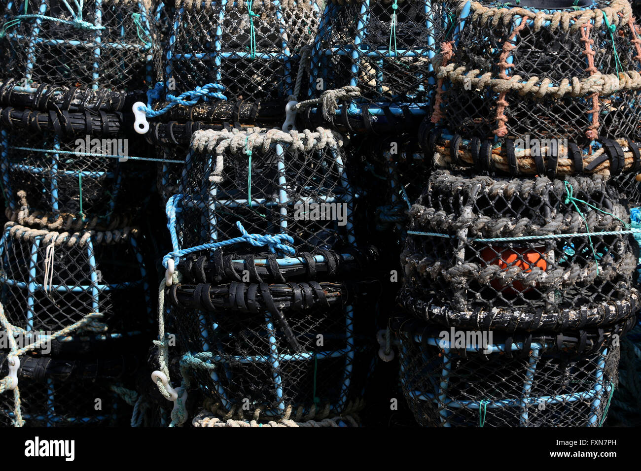 Fishing nets and traps pictured on shore and ready to use at Sovereign ...