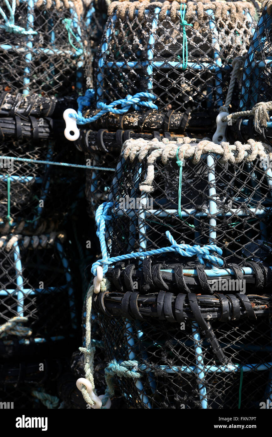 Fishing nets and traps pictured on shore and ready to use at Sovereign ...