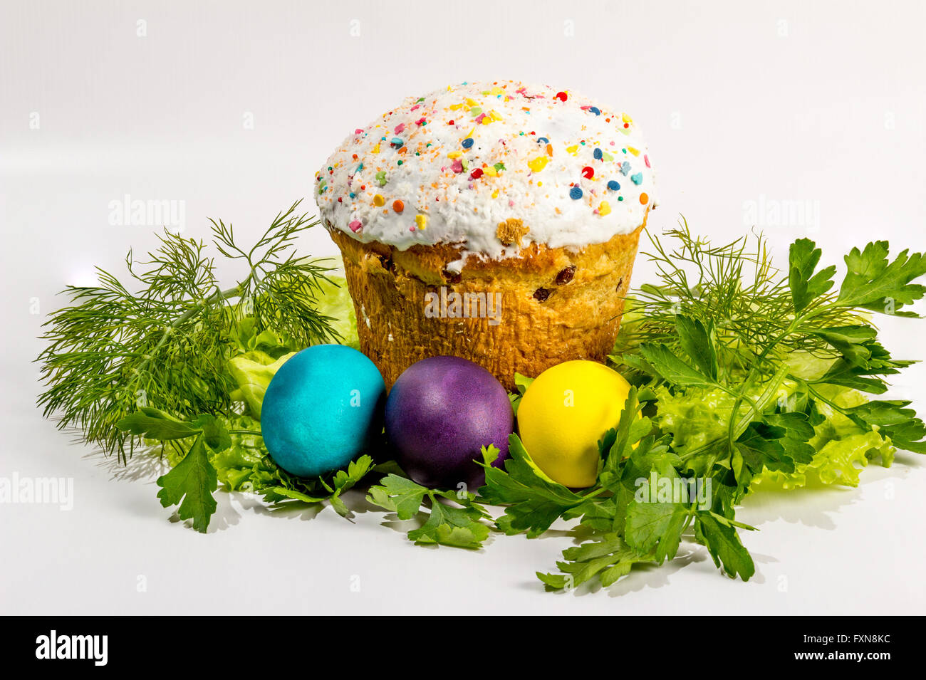 Easter cake and painted in different colors Easter eggs Stock Photo - Alamy
